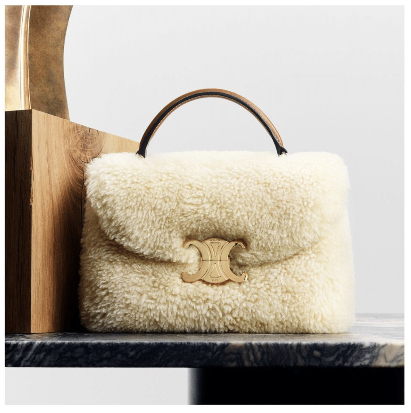 CELINE Nino in shearling the chic accessory for winter in Paris Paris Select