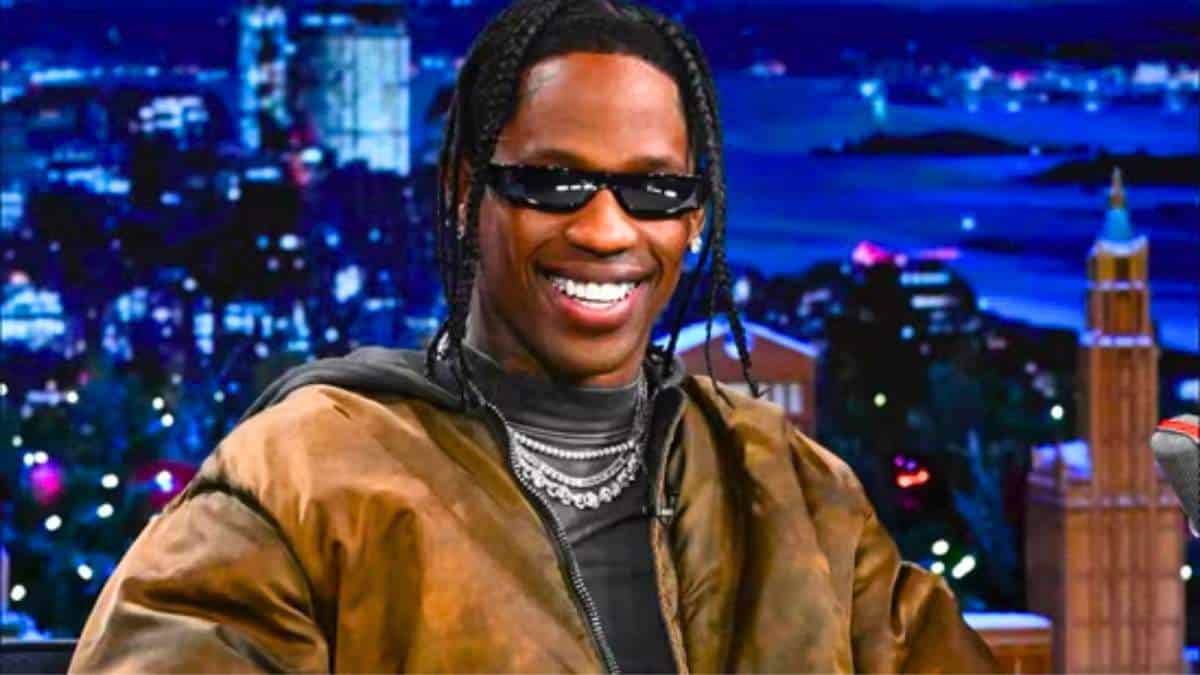 Travis Scott pulls out a 1989 Chanel jersey at Super Bowl 2026 and ...
